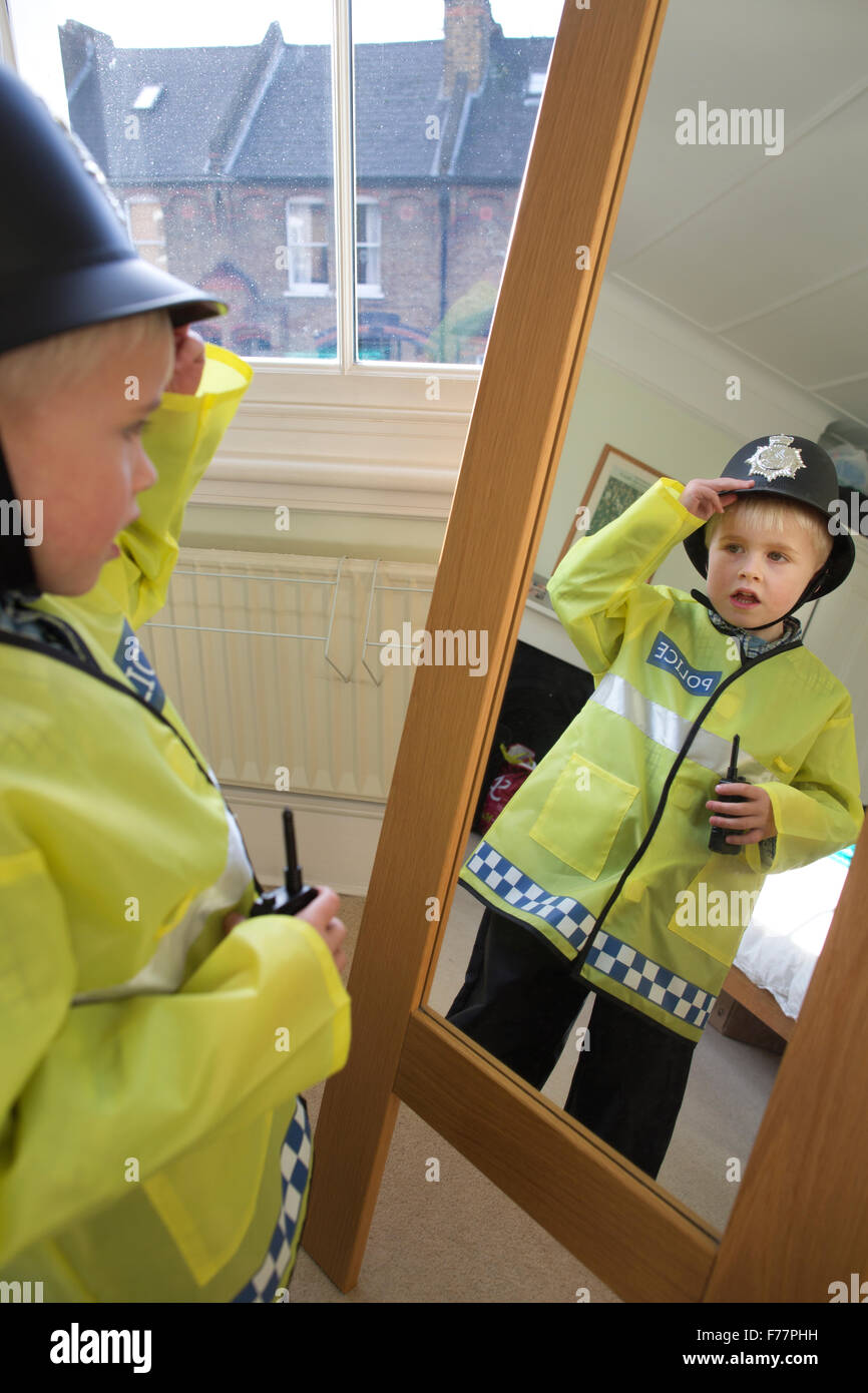 Boy (aged 4) wearing his British 'Bobby' Police Officer costume in ...