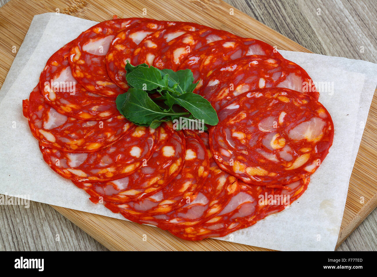 Traditional Spanish salami - Chorizo sausage on the wood background ...