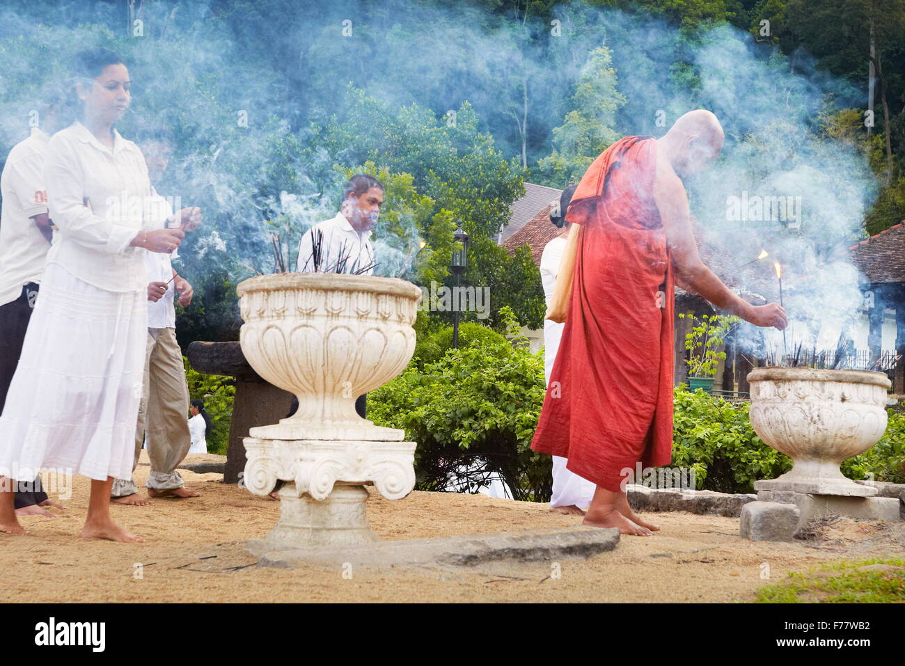 Buddhist monk praying and temple hi-res stock photography and images ...
