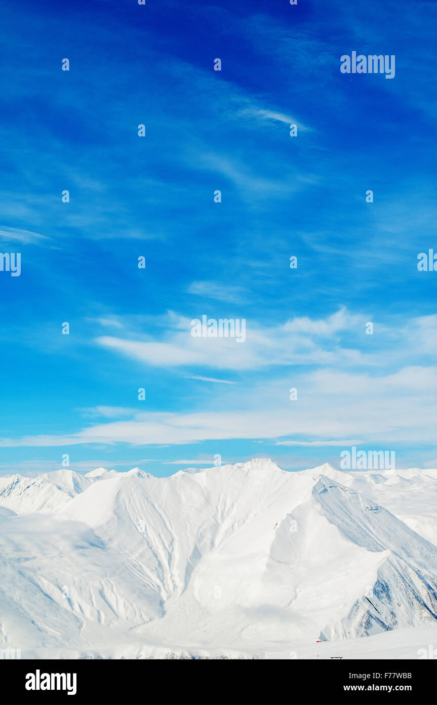 Snow mountains on bright winter day Stock Photo - Alamy