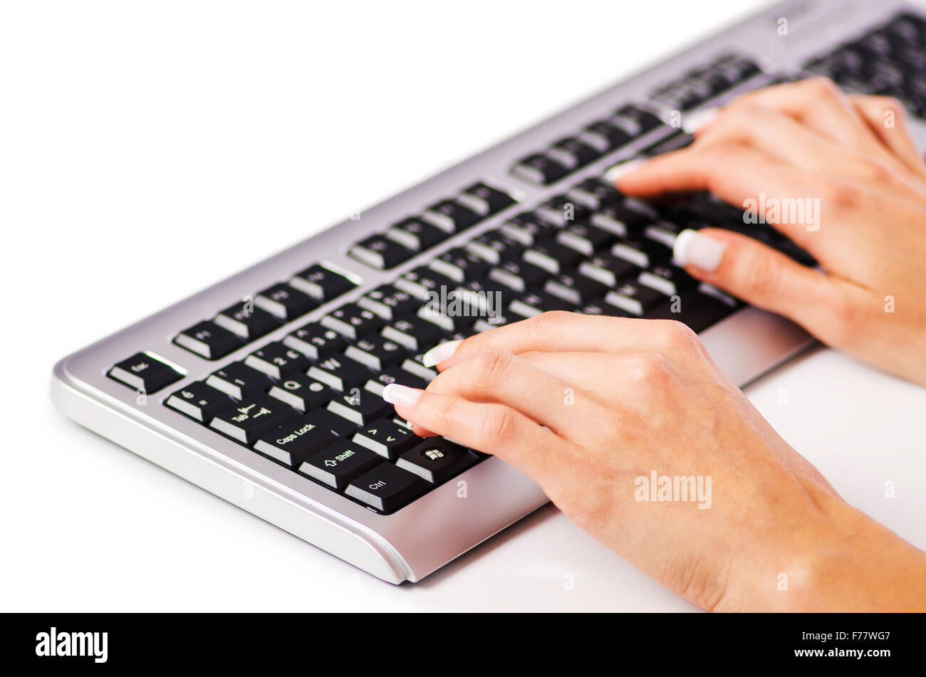 Hands working on the keyboard Stock Photo - Alamy