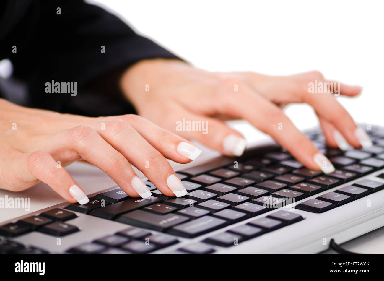 Hands working on the keyboard Stock Photo - Alamy