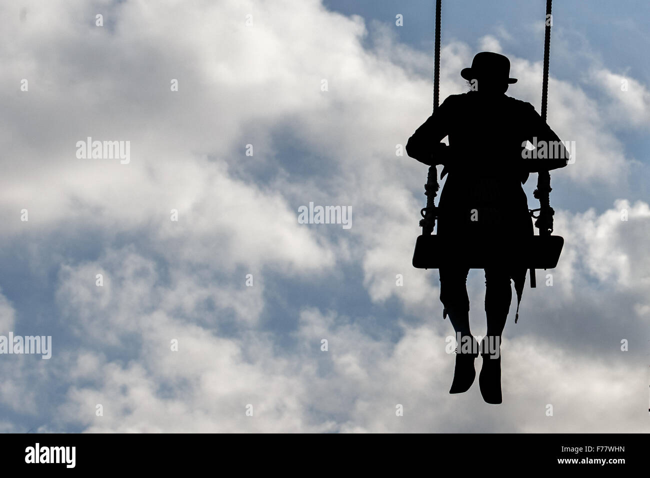 New York, USA. 26th Nov, 2015. An acrobat swings on the "Dreamseeker ...