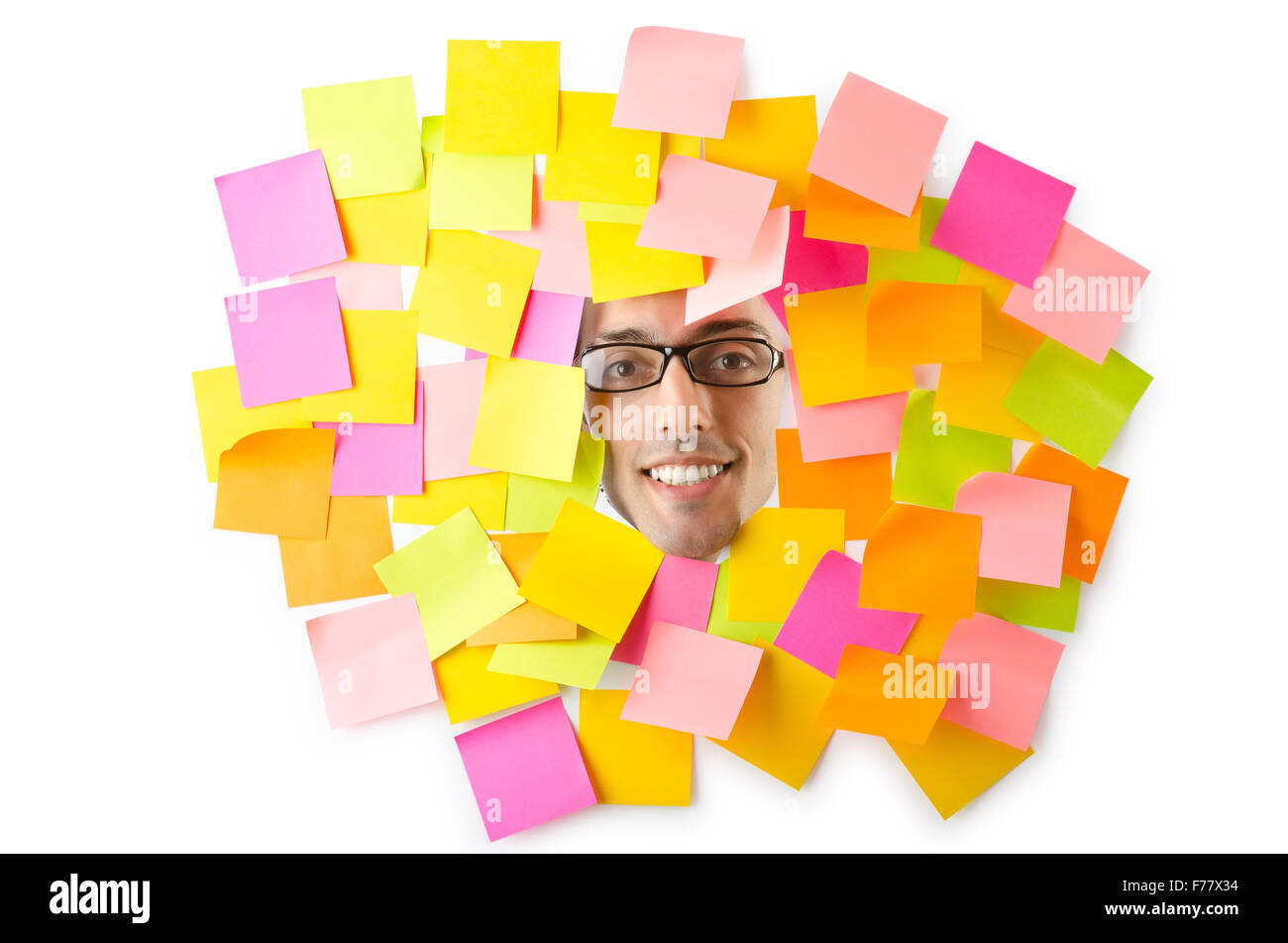 Man's face through paper and reminders Stock Photo - Alamy