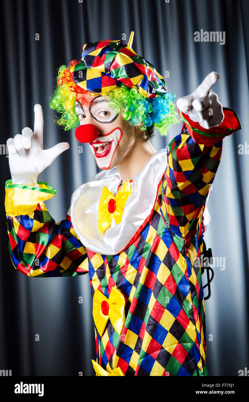 Funny clown in the studio shooting Stock Photo - Alamy