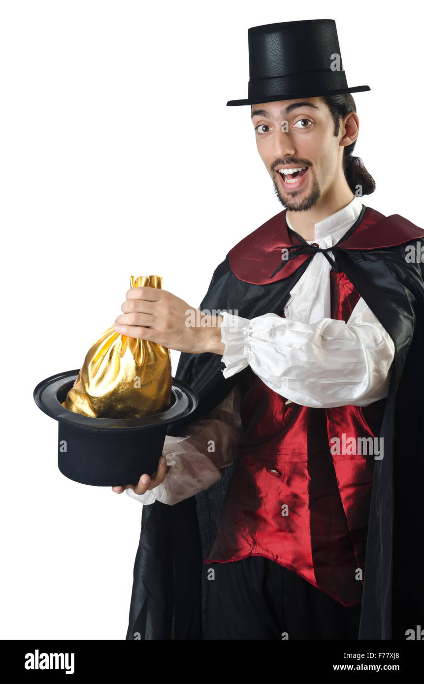 Magician doing tricks on white Stock Photo - Alamy
