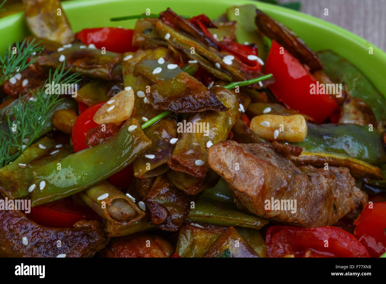 Asian cuisine - Stir fried pork with vegetables Stock Photo - Alamy