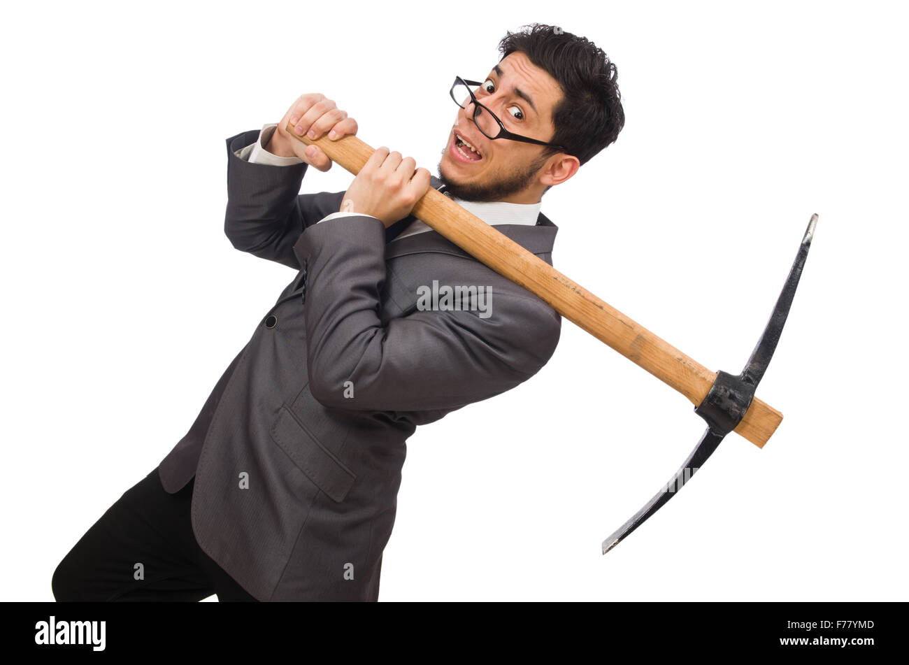 Young businessman holding a tool isolated on white Stock Photo - Alamy