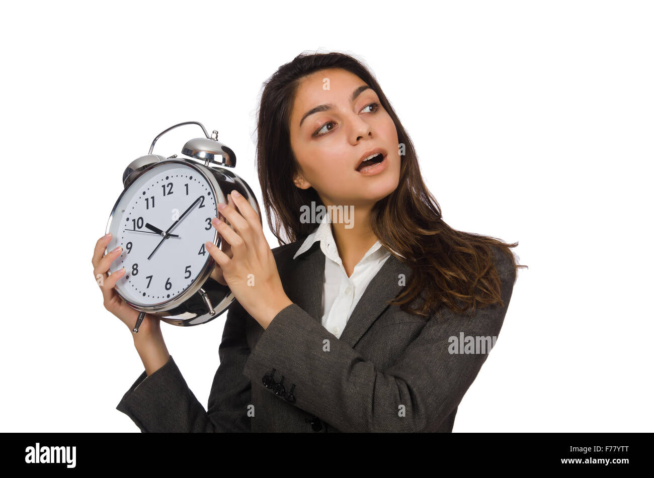 Businesswoman with clock missing her deadlines Stock Photo - Alamy
