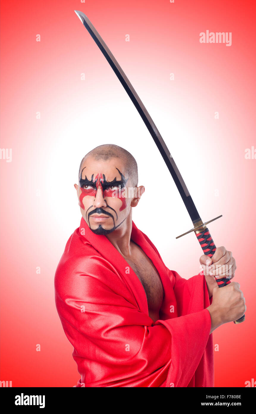 Man with sword isolated on white Stock Photo - Alamy