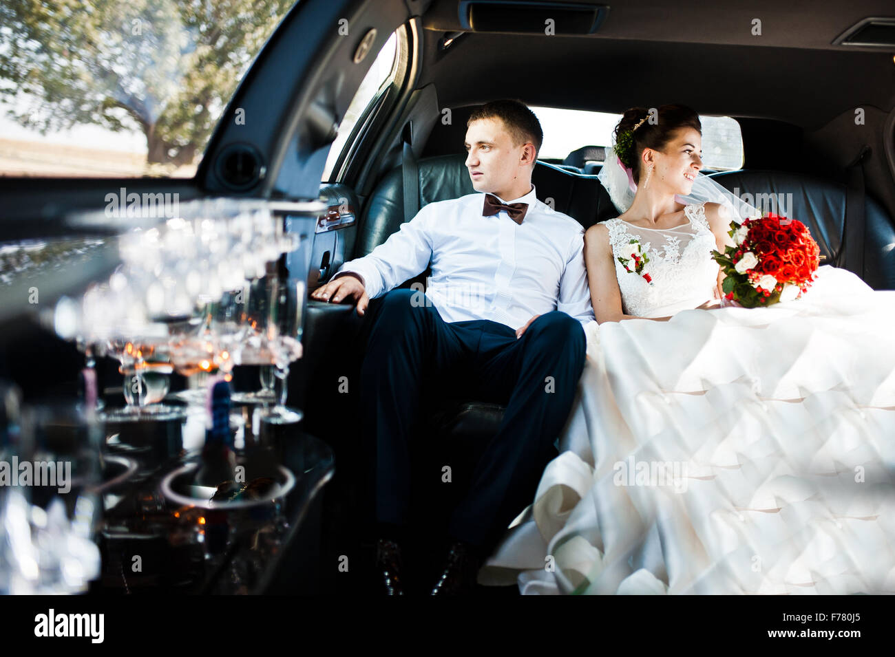 wedding couple indoor the limousine Stock Photo - Alamy