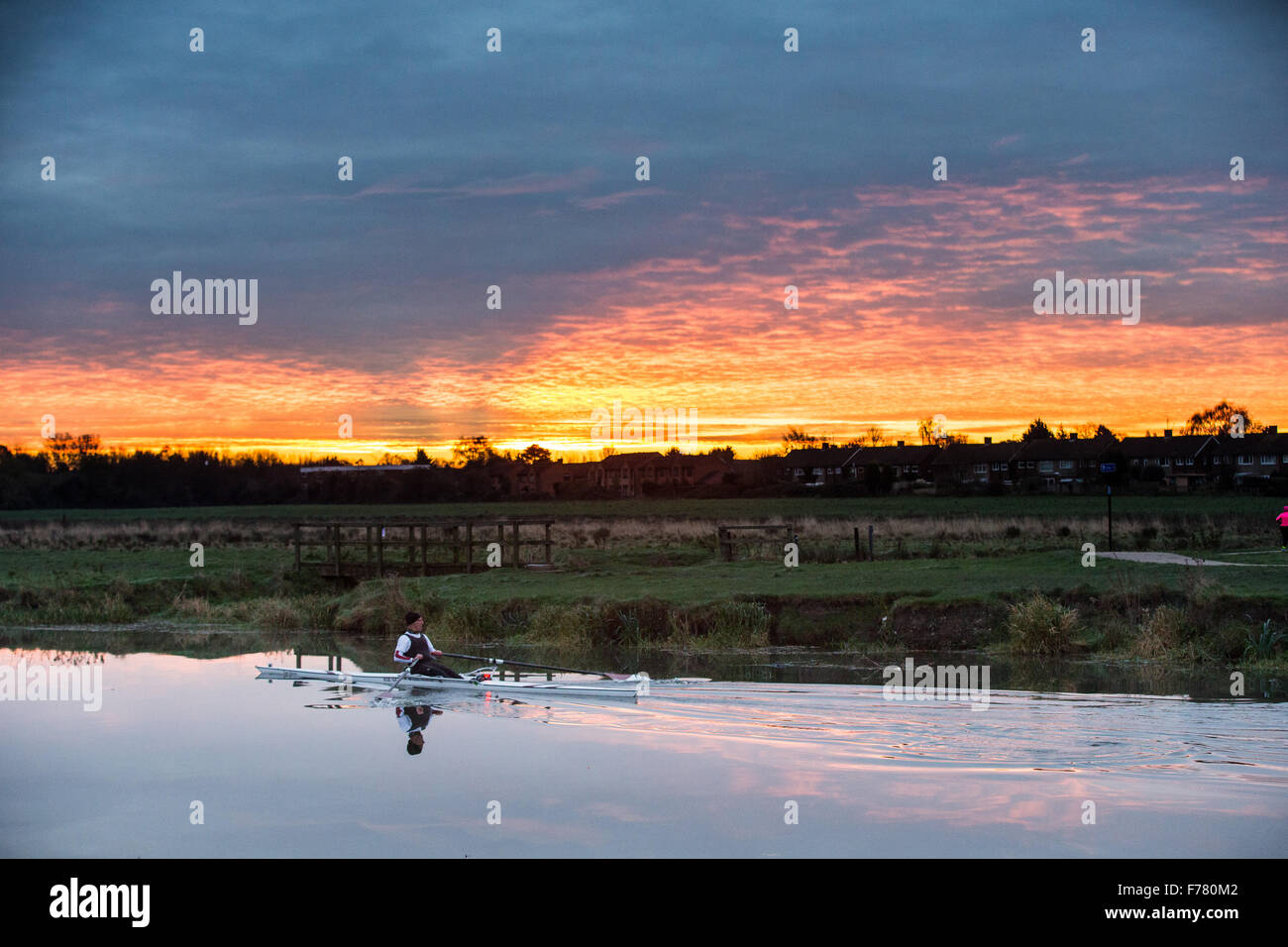 Cambridge rowers on the River Cam in Cambridge at sunrise in the autumn ...
