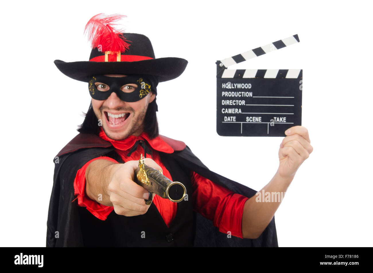 Young man in carnival coat with gun and clapper isolated on white Stock ...