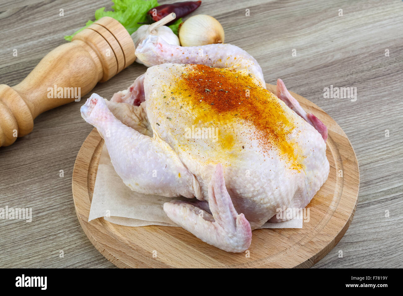 Raw chicken with spices ready for cooking Stock Photo - Alamy