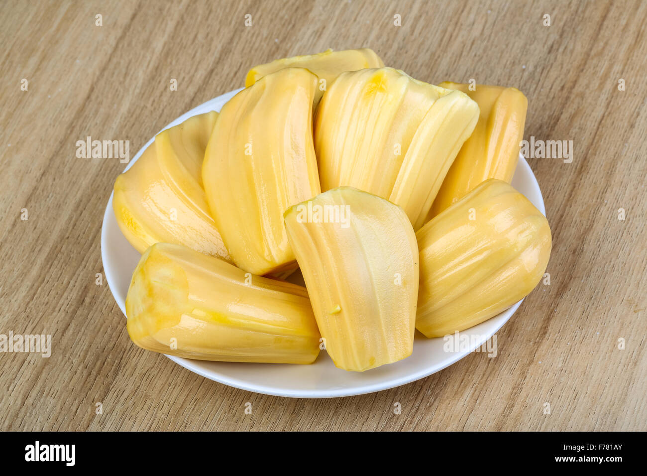 Tropical Jack Fruit on the wood background Stock Photo - Alamy