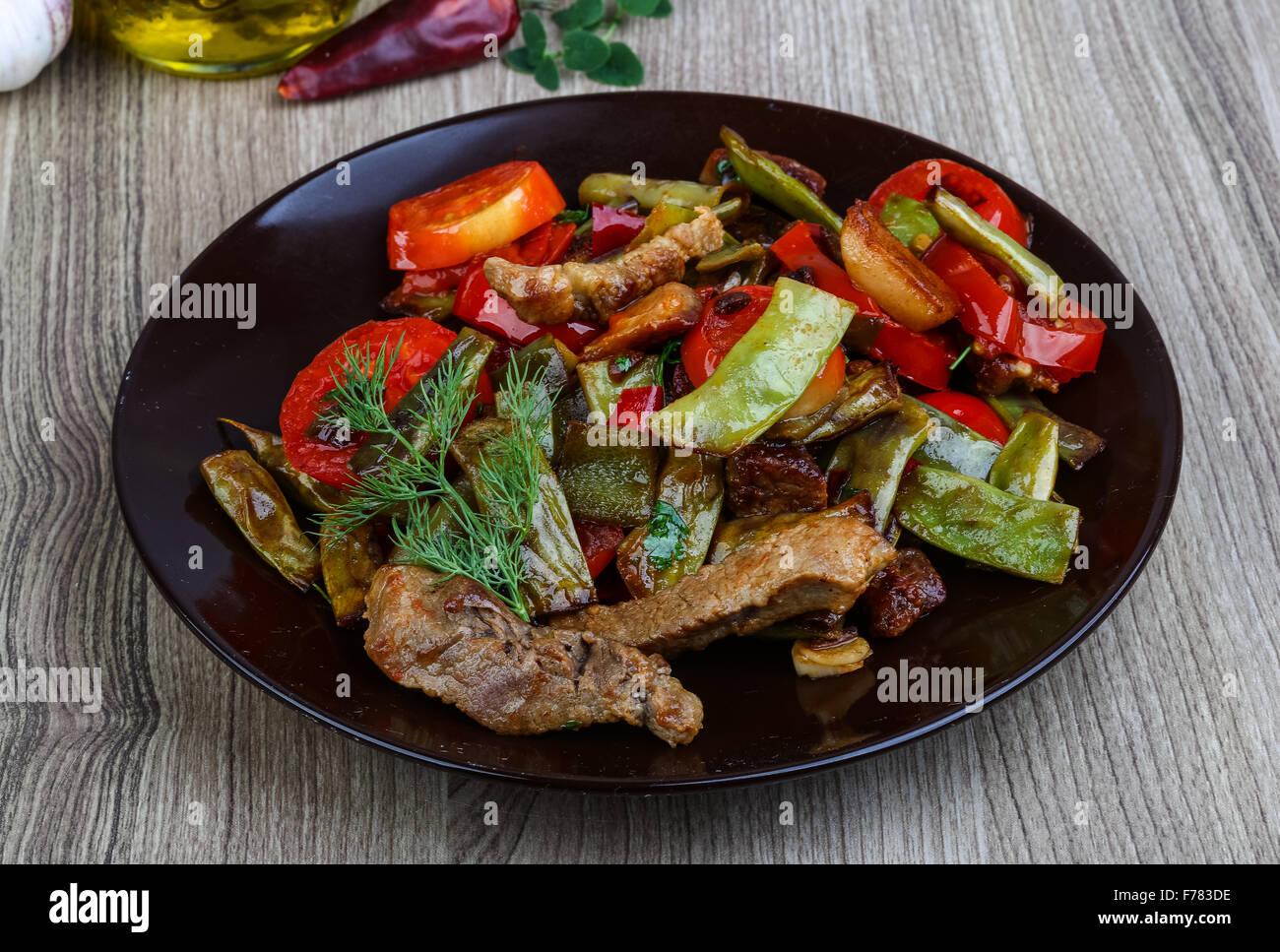 Asian cuisine - Stir fried pork with vegetables Stock Photo - Alamy