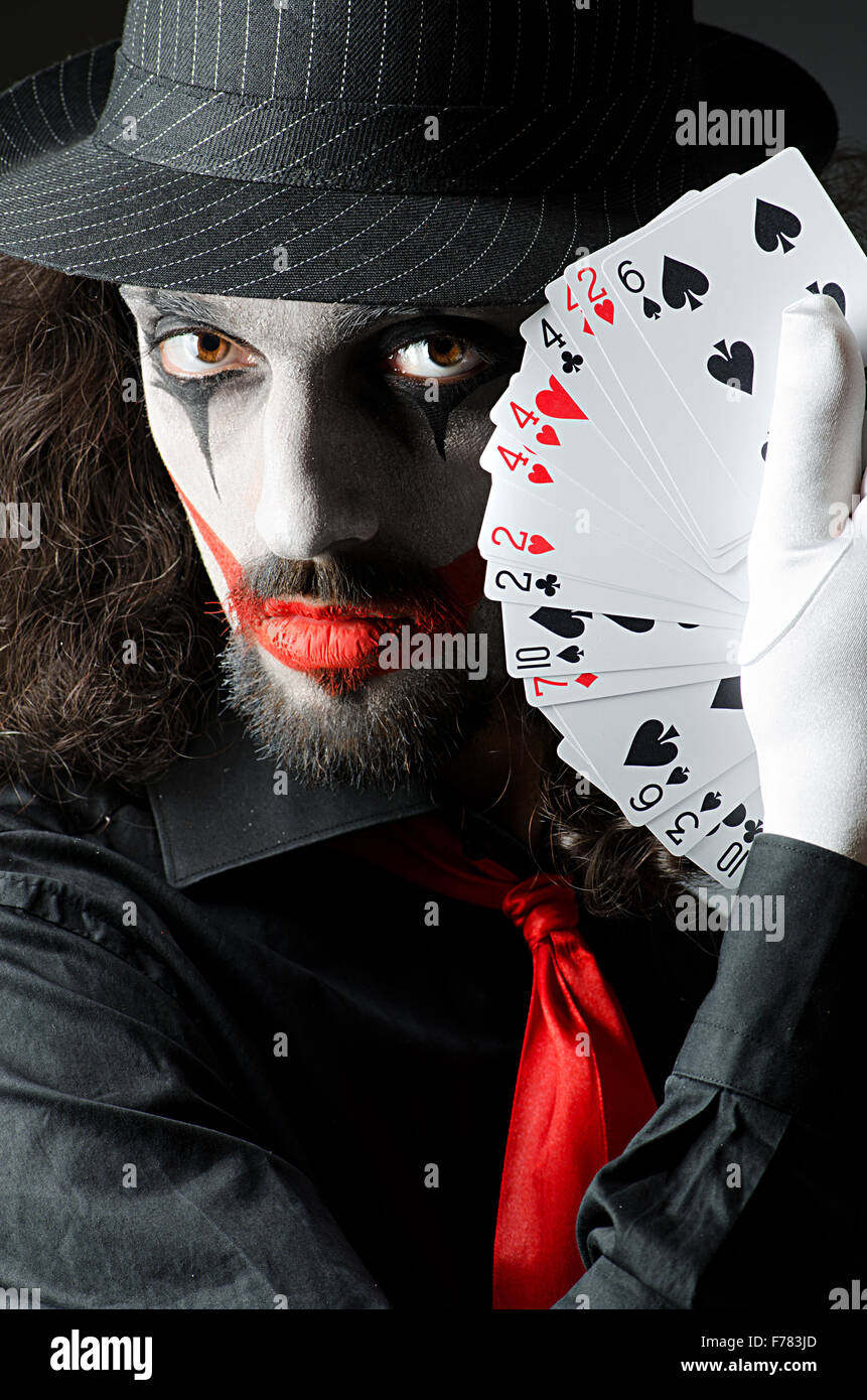 Joker with cards in studio shoot Stock Photo - Alamy