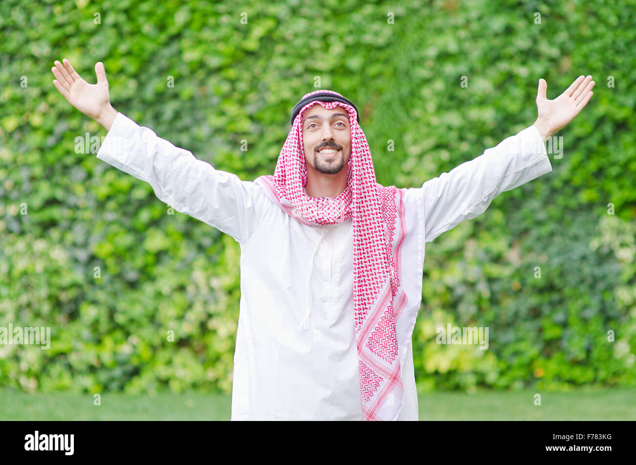 Arab on the street in summer Stock Photo - Alamy