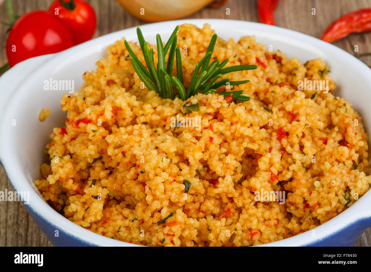 Arabic traditional cuisine - Couscous with tomato and green onion Stock ...