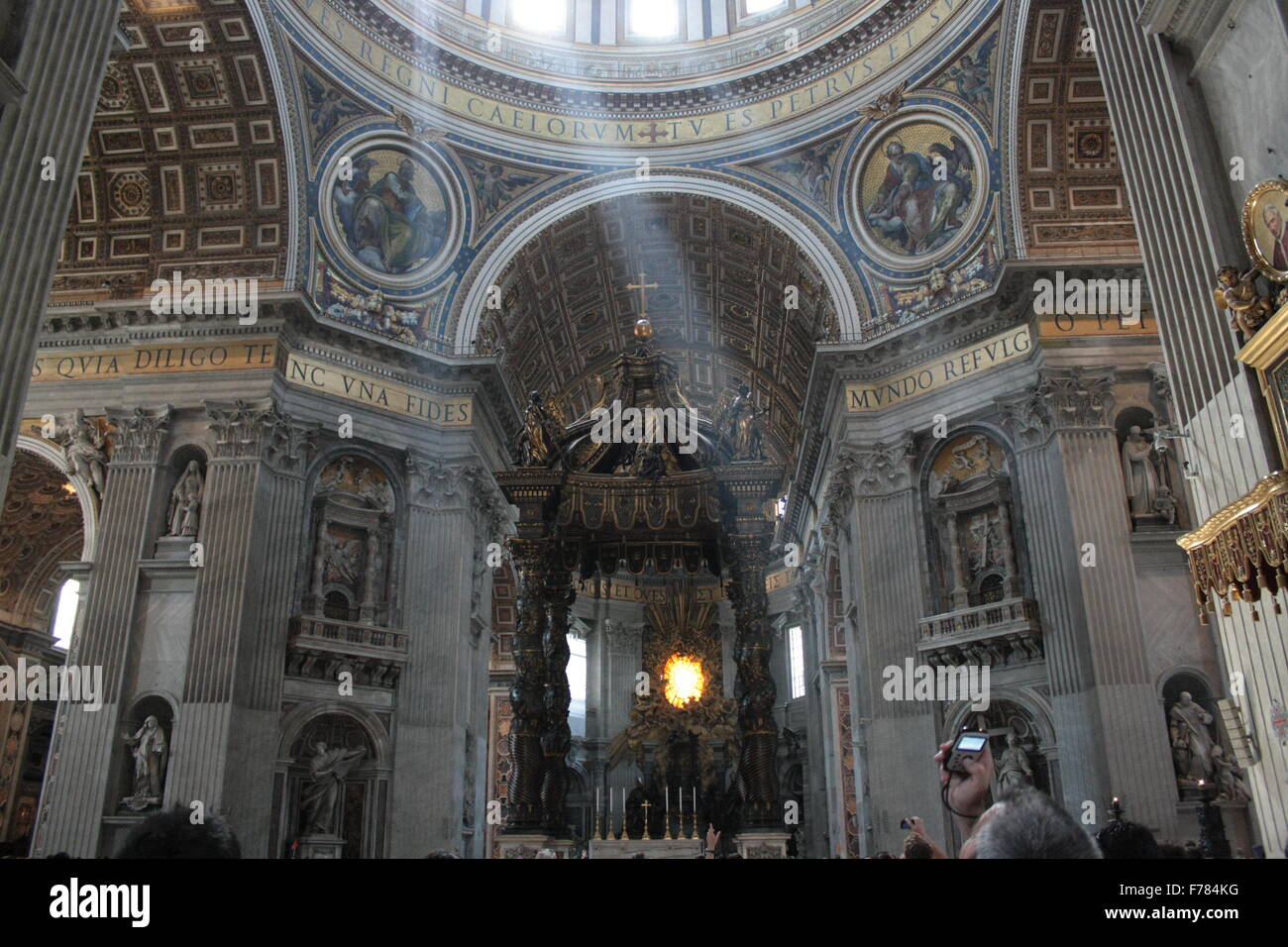 Rays of light shining into the Vatican Church Stock Photo - Alamy