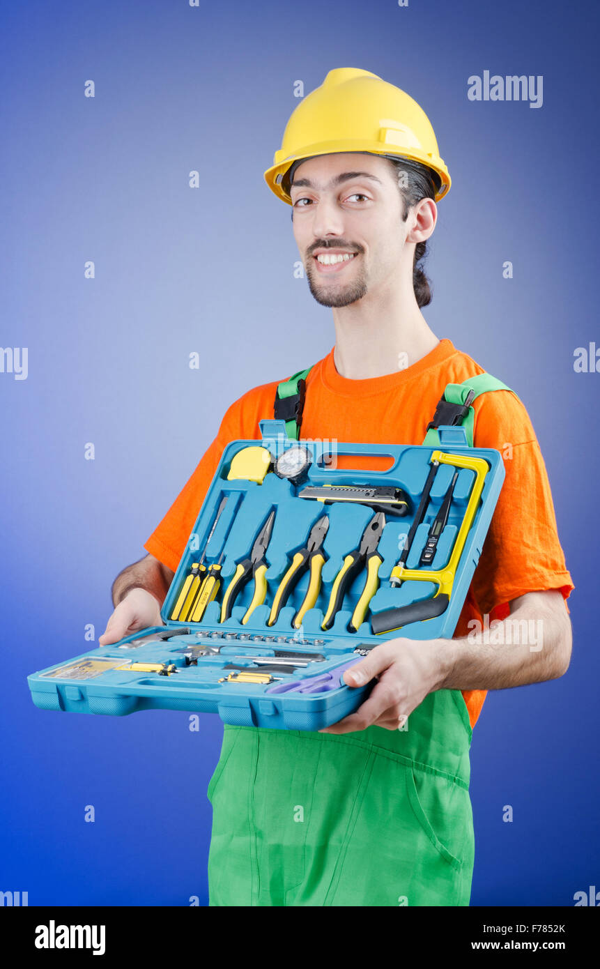 Repairman with his toolkit Stock Photo - Alamy