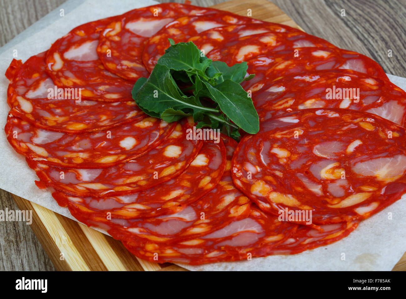 Traditional Spanish salami - Chorizo sausage on the wood background ...