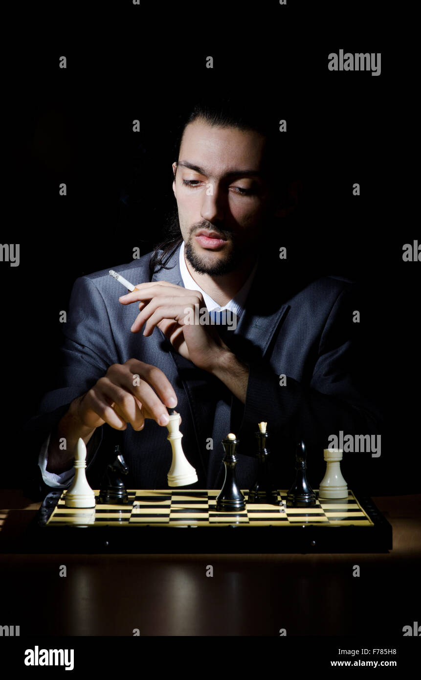 Chess player playing his game Stock Photo - Alamy
