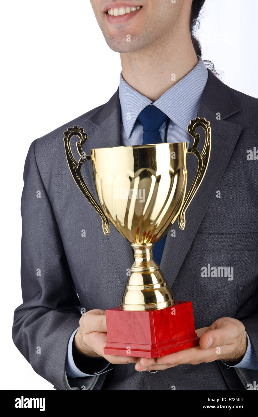Man being awarded with golden cup Stock Photo - Alamy