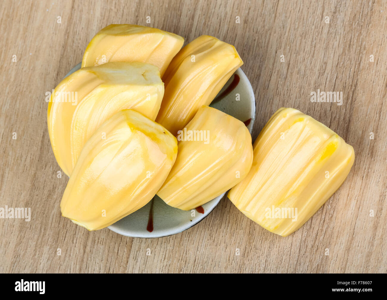 Tropical Jack Fruit on the wood background Stock Photo - Alamy