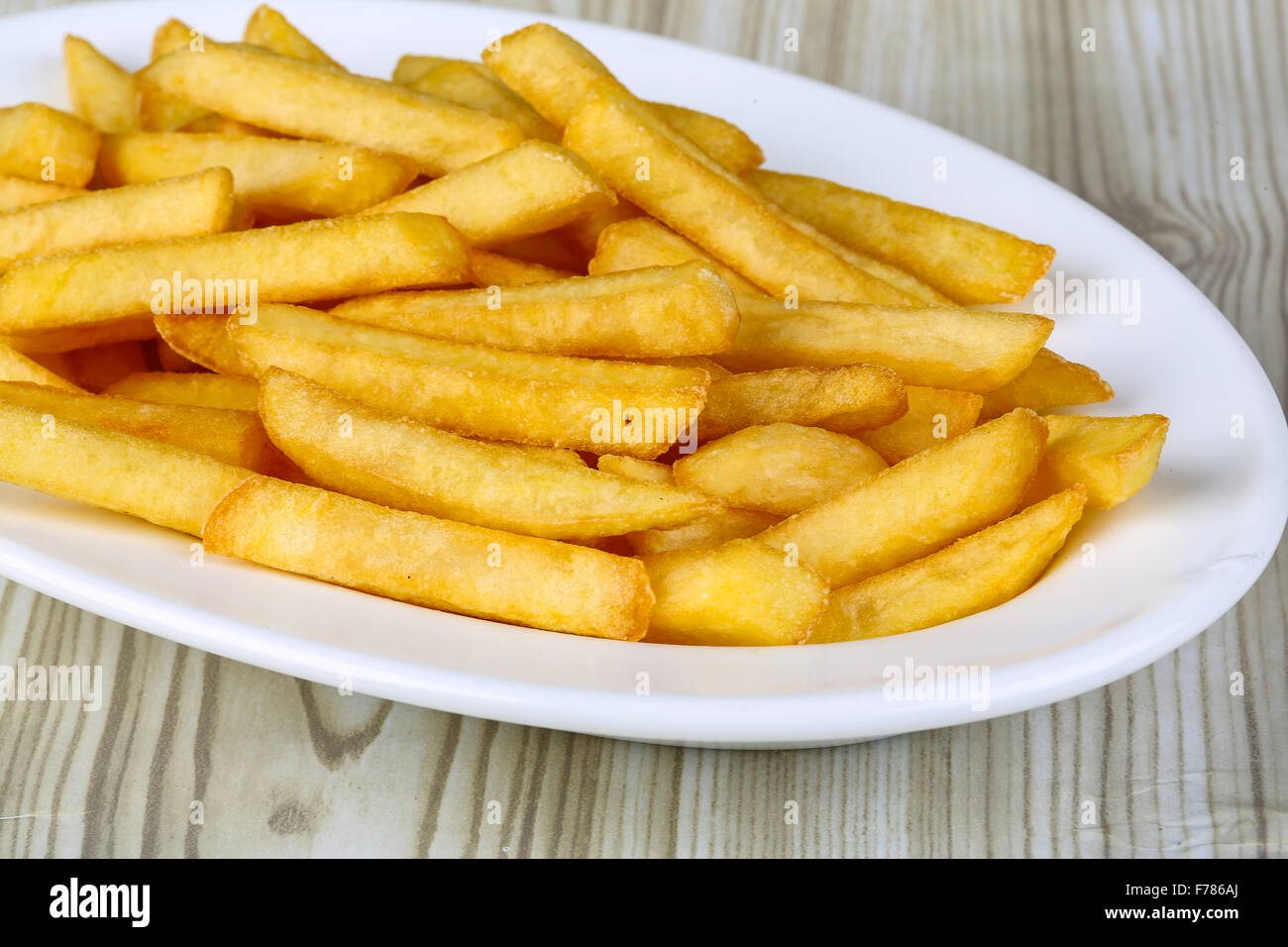 Hot fresh French fries snack in the plate Stock Photo - Alamy