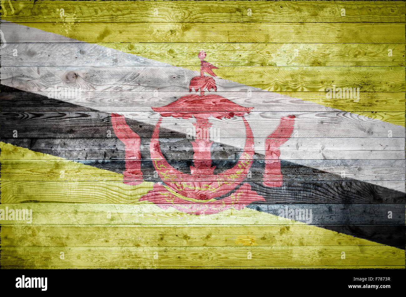 A vignetted background image of the flag of Brunei painted onto wooden ...