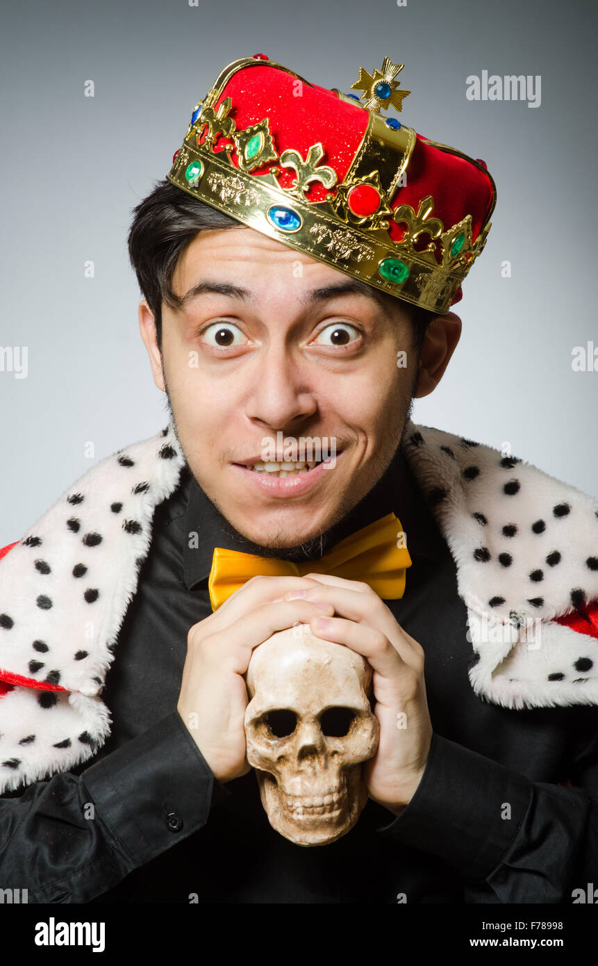 Concept with funny man wearing crown Stock Photo - Alamy