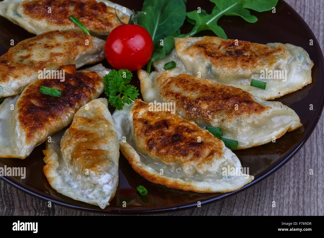 Japan traditional cuisine - fried Gyoza with sweet sauce Stock Photo ...