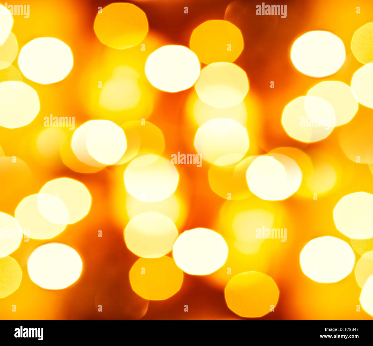 Golden festive background, beautiful blurry glowing yellow lights, New ...