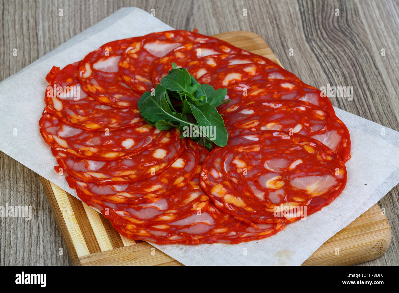Traditional Spanish salami - Chorizo sausage on the wood background ...