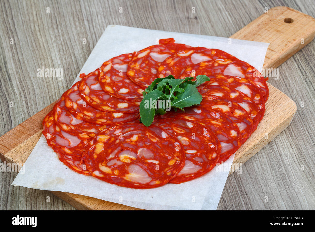 Traditional Spanish salami - Chorizo sausage on the wood background ...