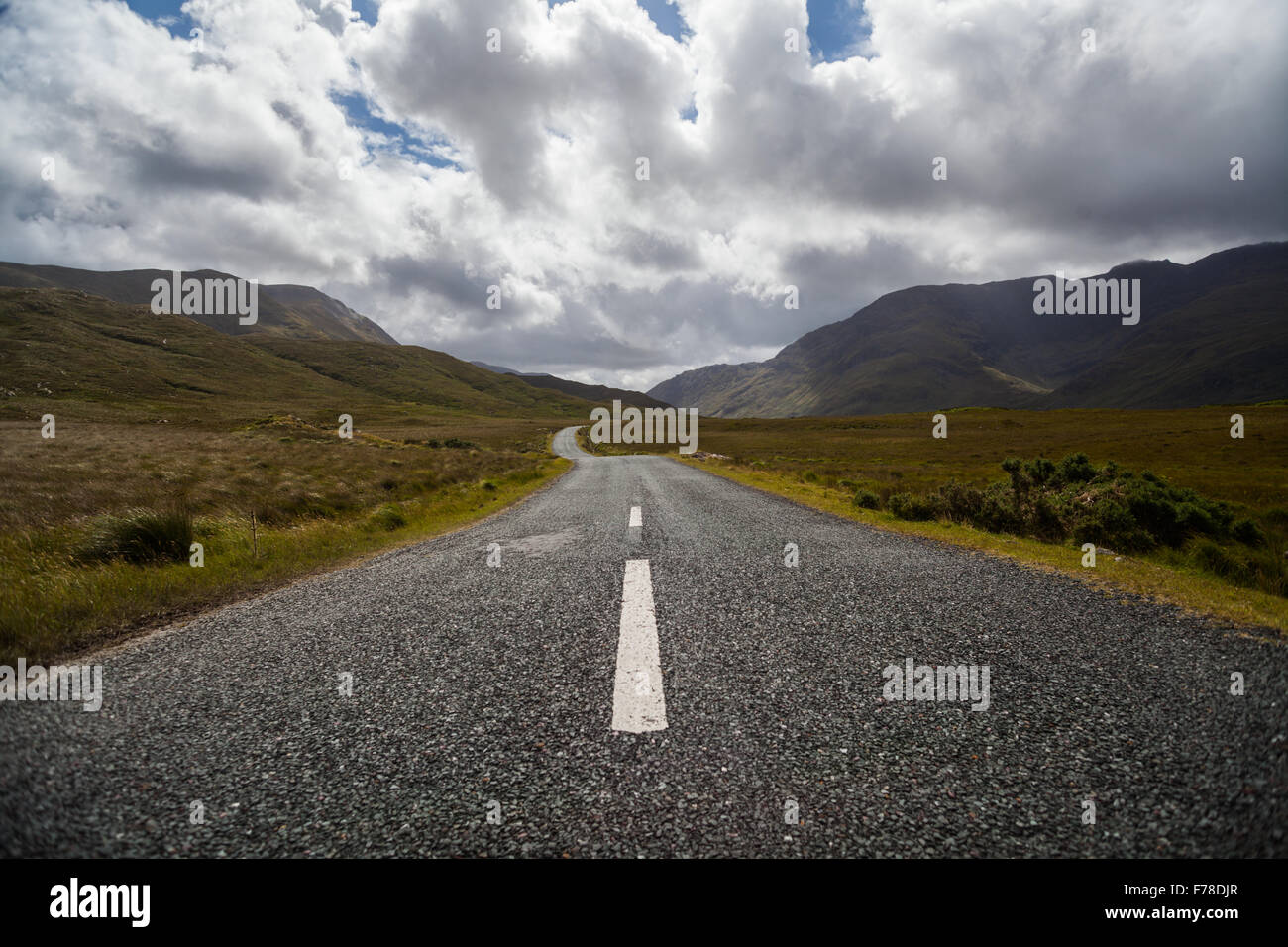 Color image of an empty road in the mountains Stock Photo - Alamy