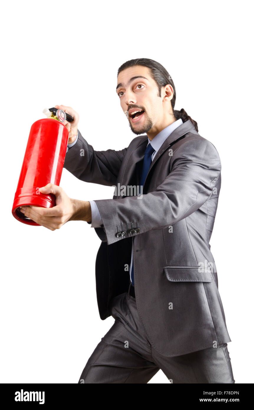 Man with fire extinguisher in firefighting concept Stock Photo - Alamy