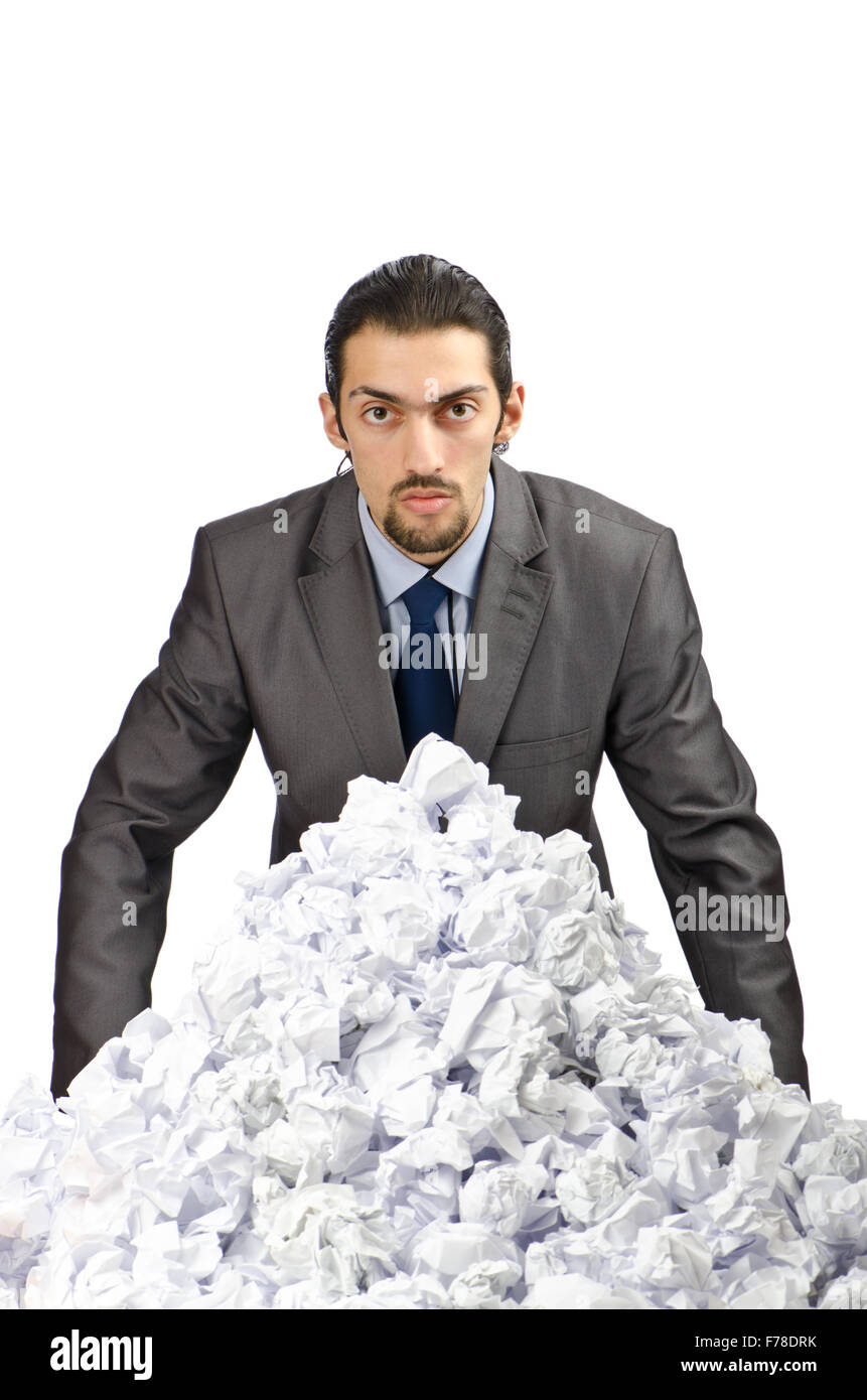 Man with lots of crumpled paper Stock Photo - Alamy