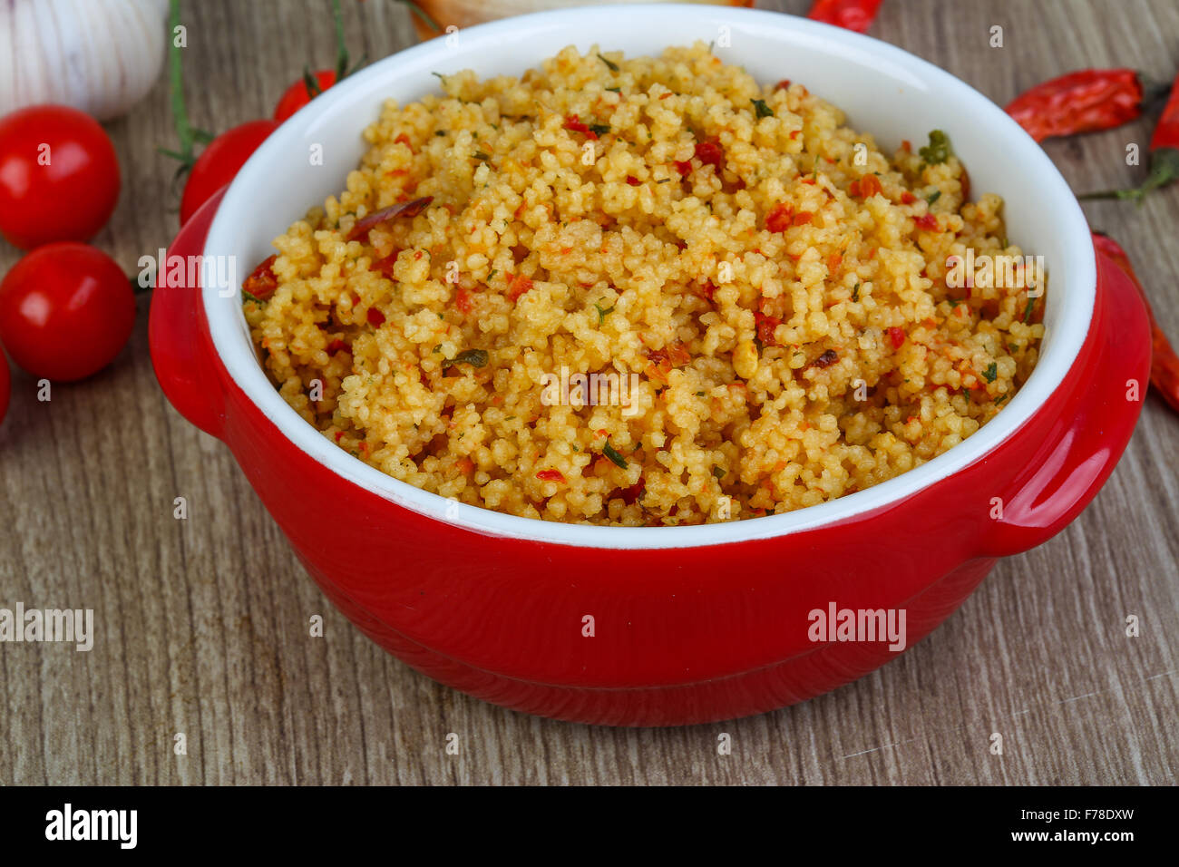 Arabic traditional cuisine - Couscous with tomato and green onion Stock ...
