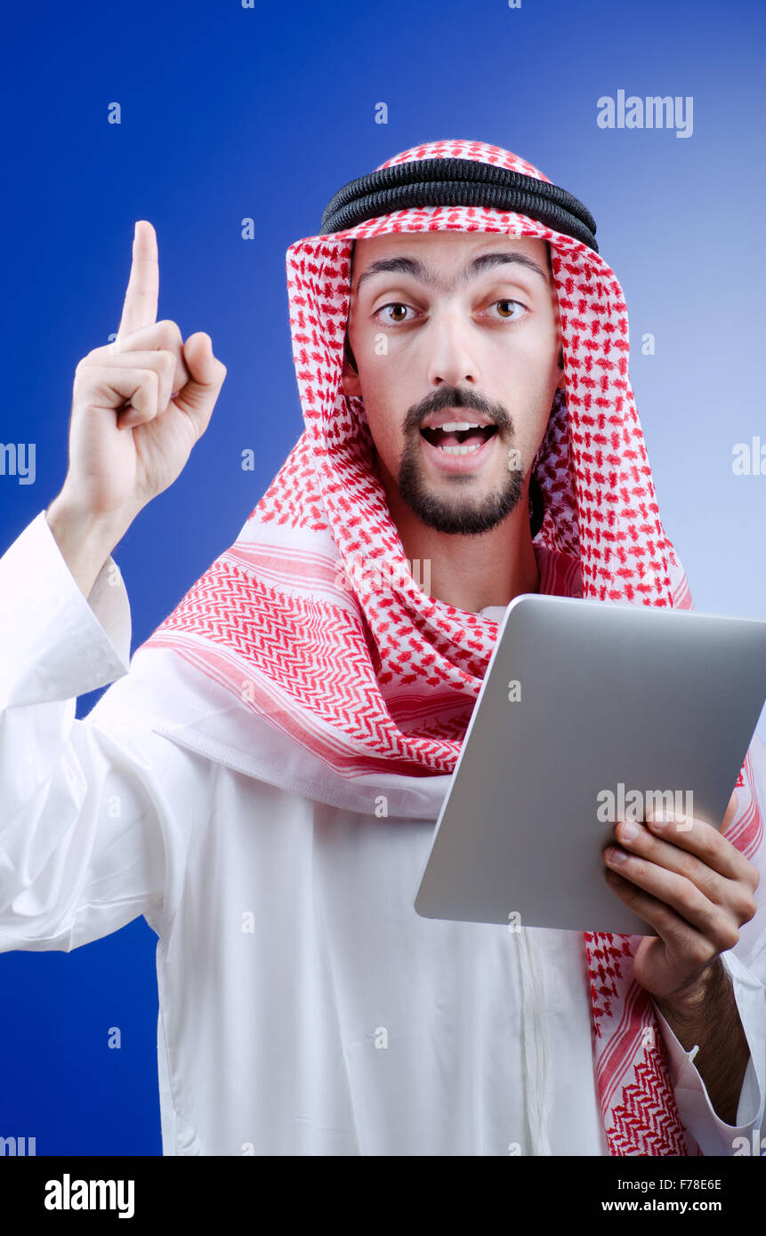 Young arab with tablet computer Stock Photo - Alamy