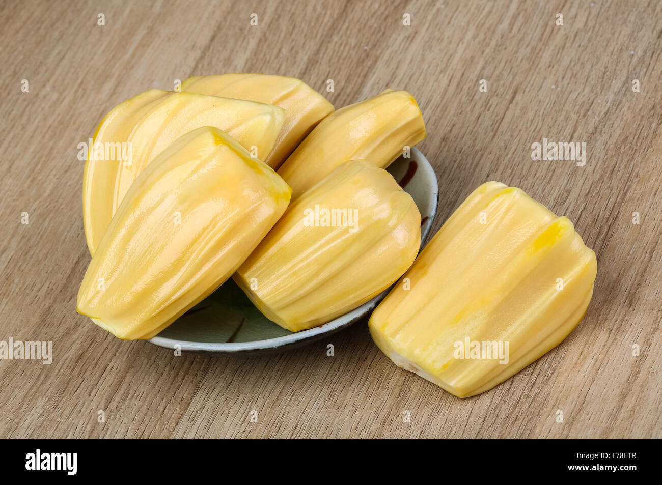 Tropical Jack Fruit on the wood background Stock Photo - Alamy