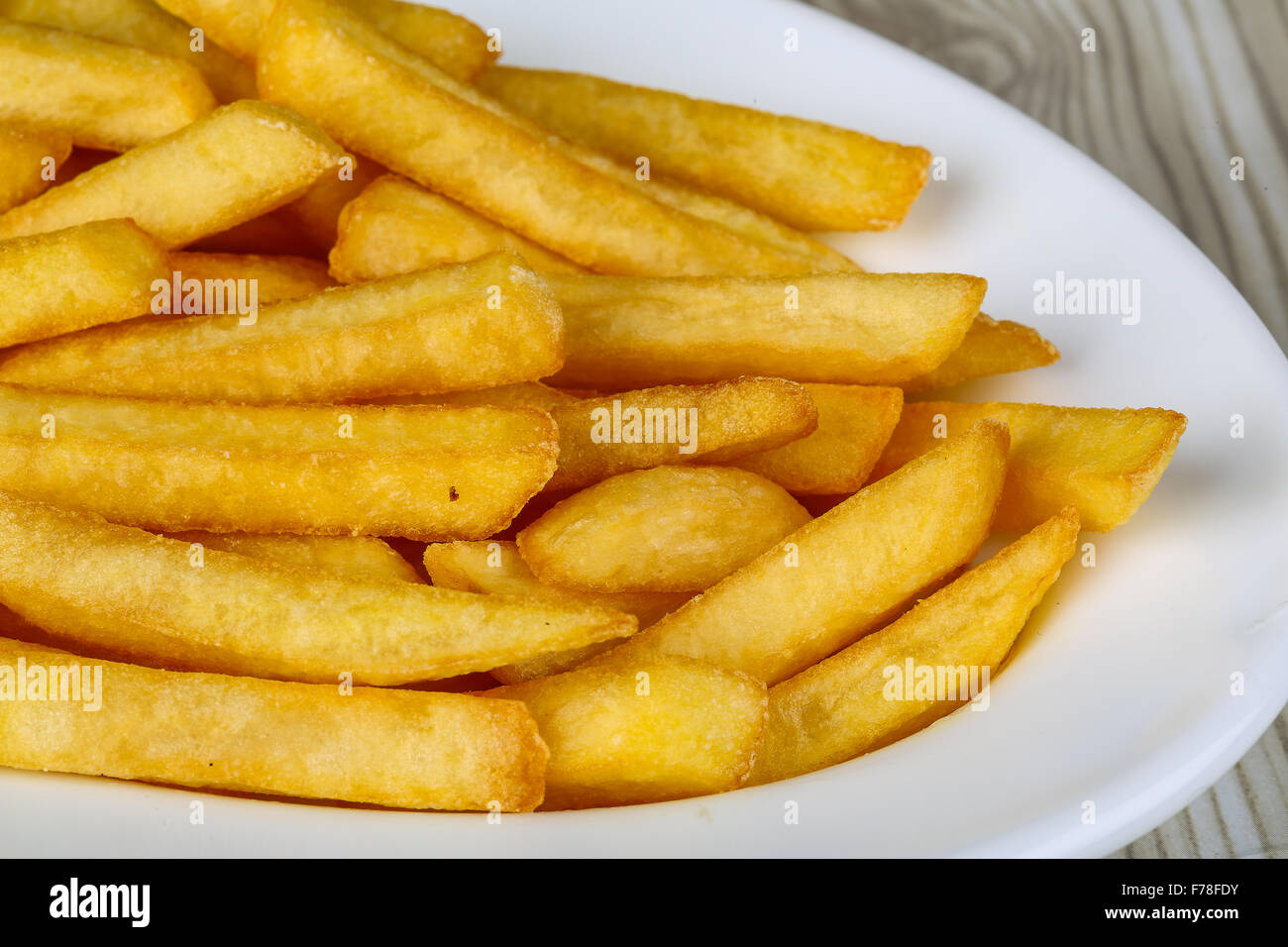 Hot fresh French fries snack in the plate Stock Photo - Alamy