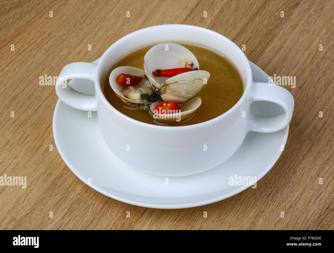 Asian traditional Shell soup on the wood background Stock Photo - Alamy