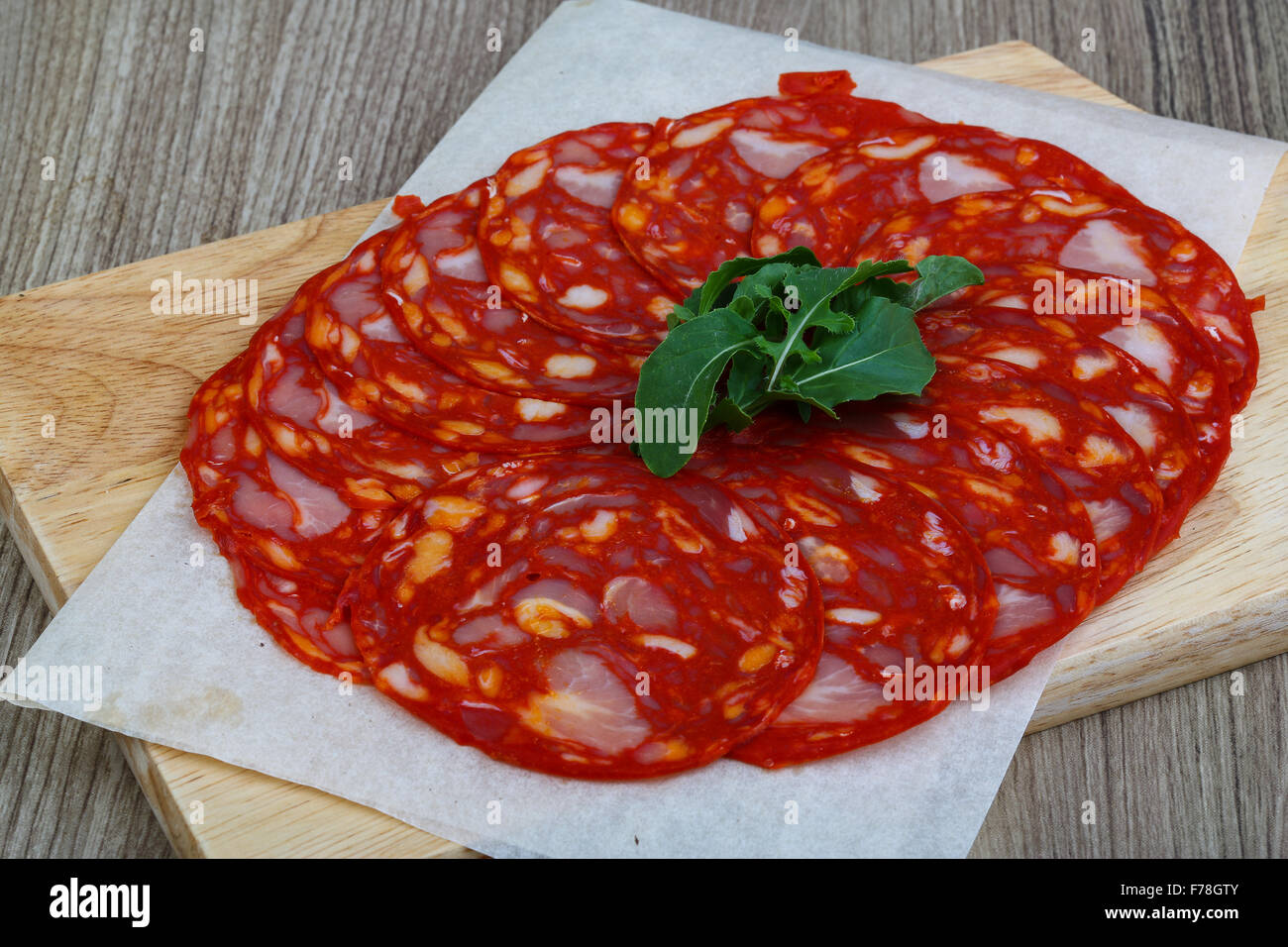 Traditional Spanish salami - Chorizo sausage on the wood background ...