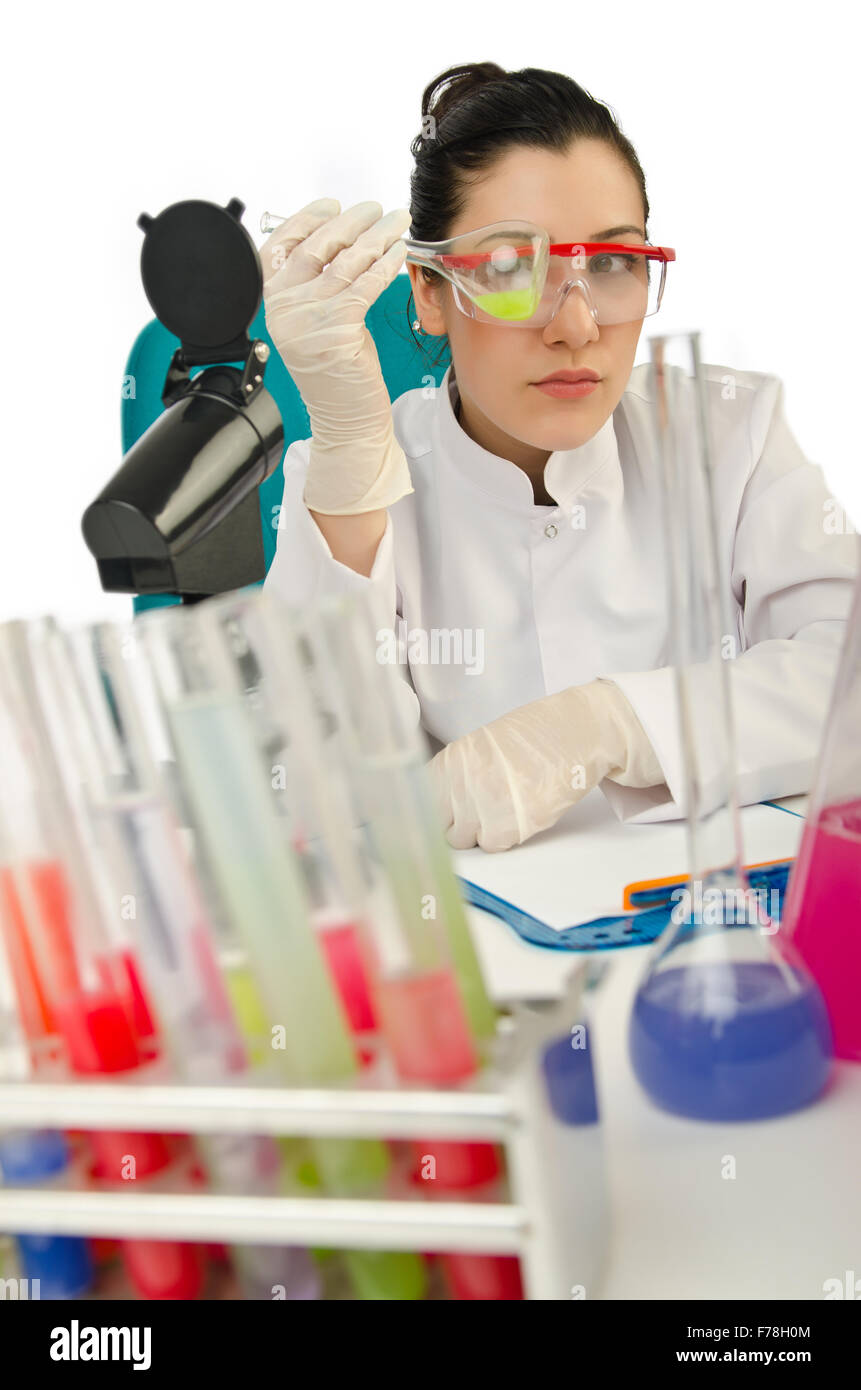 Female chemist in studio on white Stock Photo - Alamy