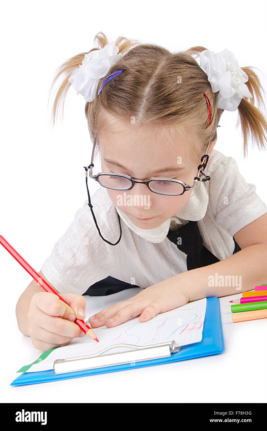 Little girl writing with pencils Stock Photo - Alamy