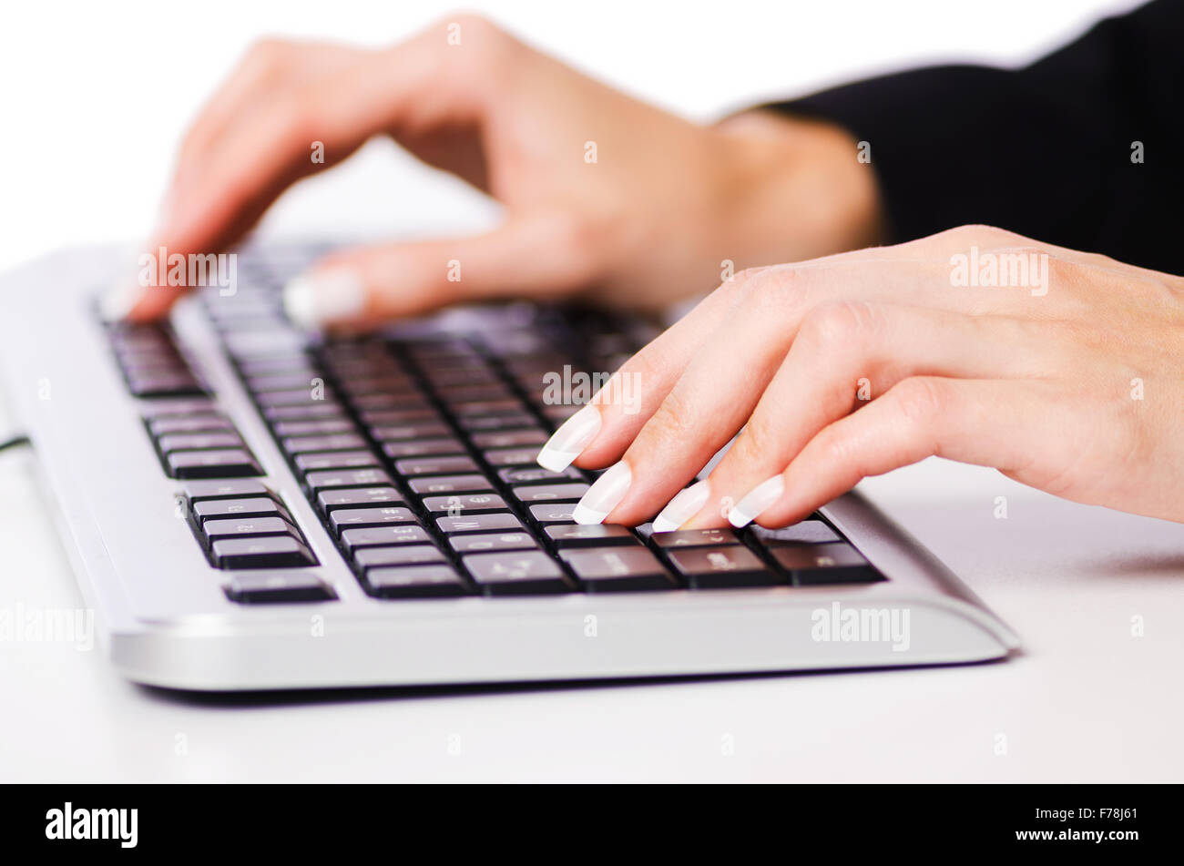 Hands working on the keyboard Stock Photo - Alamy