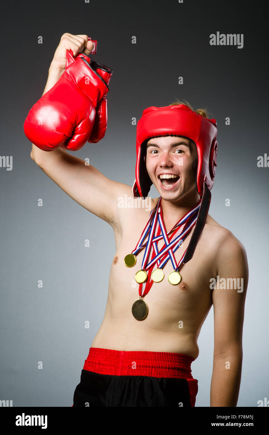 Funny boxer with winning gold medal Stock Photo - Alamy