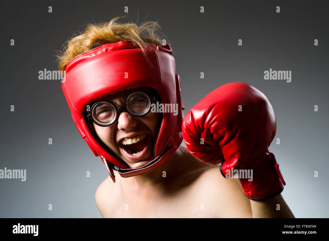 Funny boxer against dark background Stock Photo - Alamy